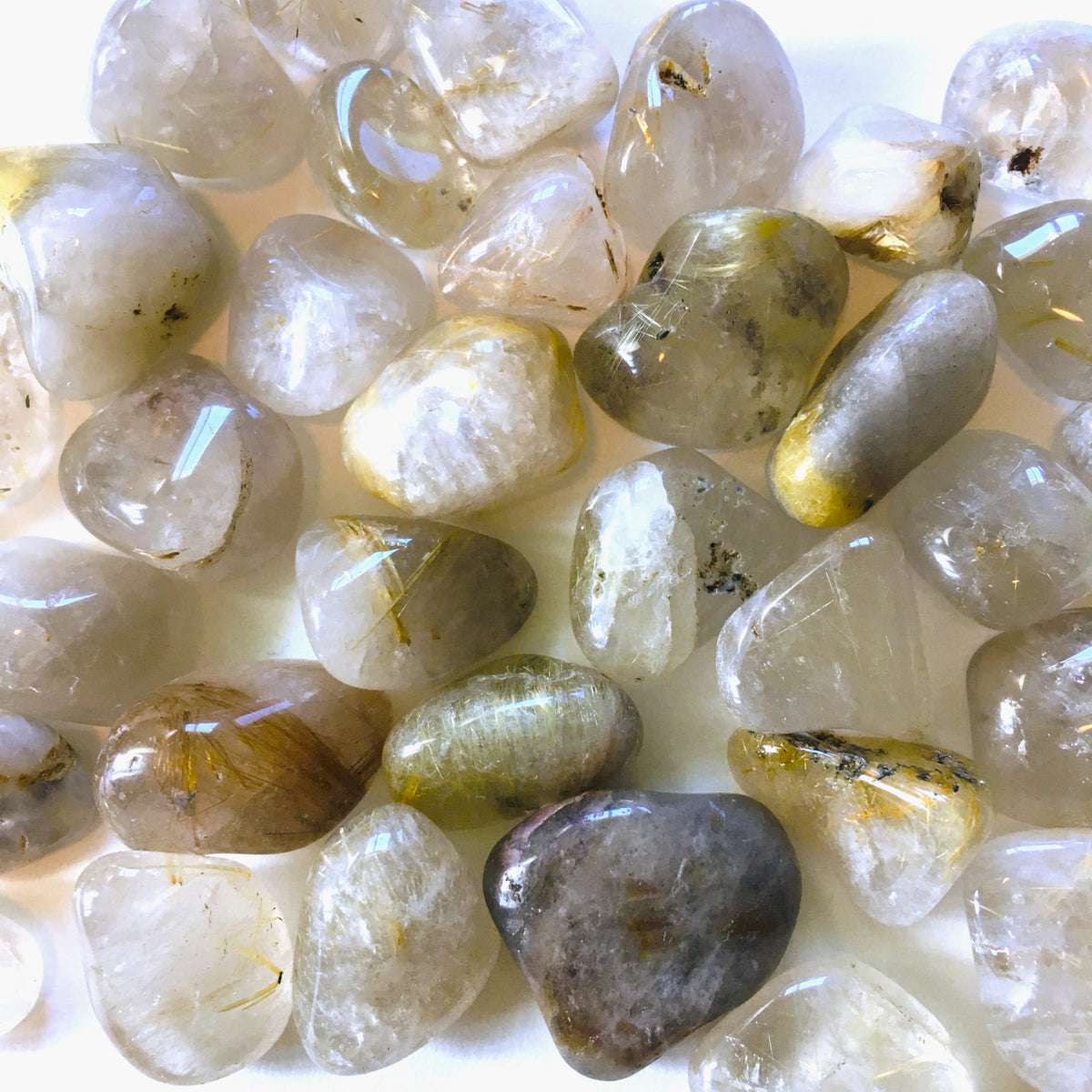 Rutilated Quartz Tumbled – Five Sisters Crystals